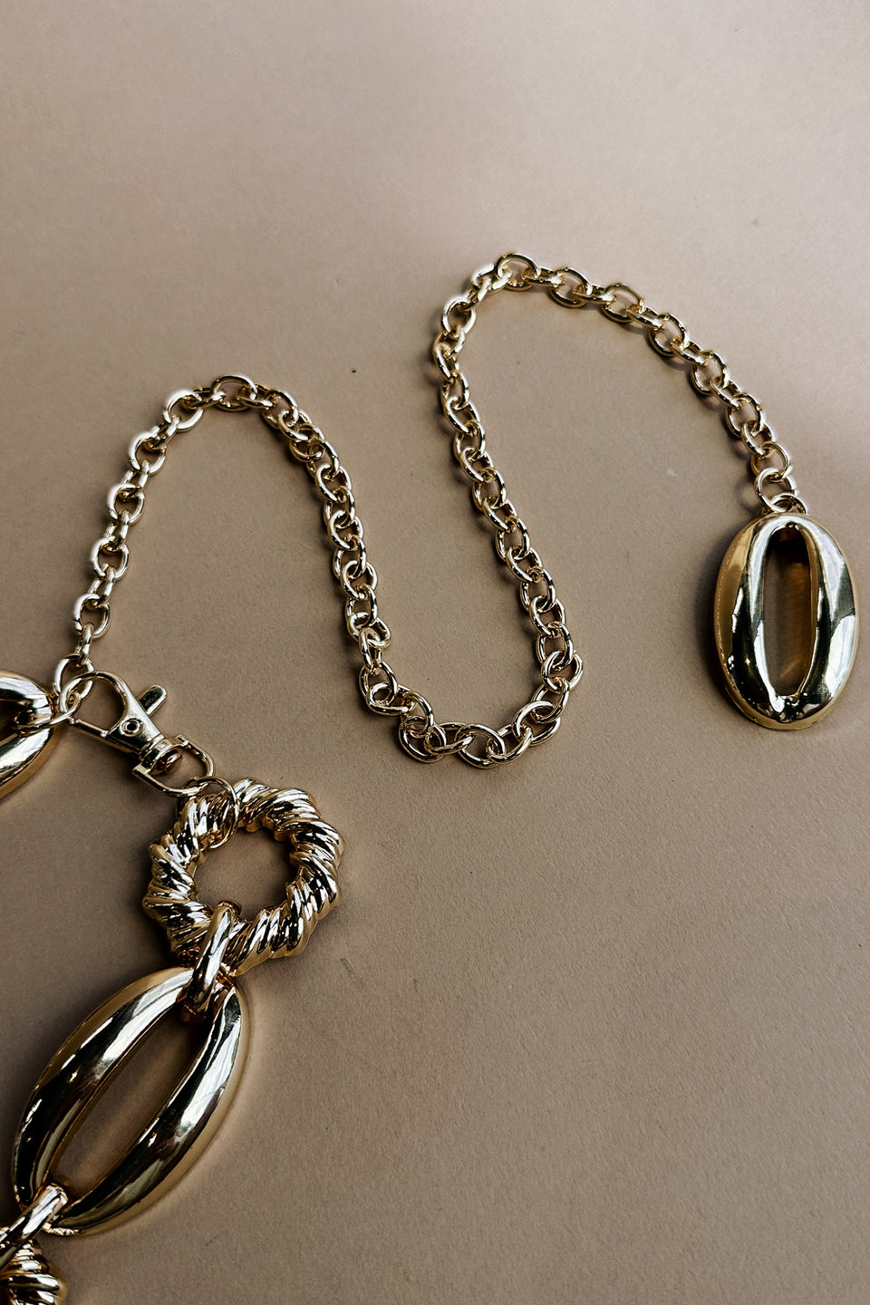 Audrey Gold Oval & Starburst Medallion Chain Belt - Lizard Thicket