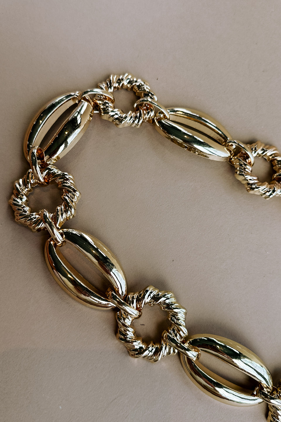 Audrey Gold Oval & Starburst Medallion Chain Belt - Lizard Thicket